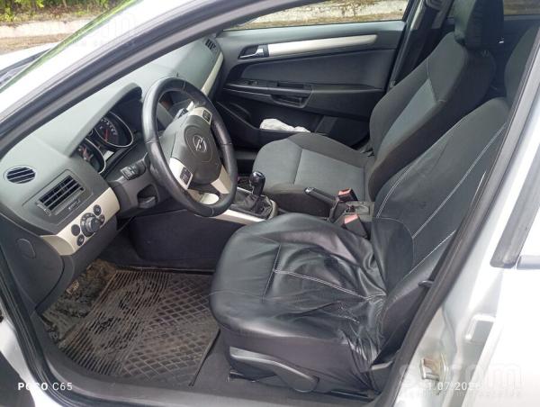 Grey Opel Astra 2007 in Dobele, with an engine capacity of 1.90 L and mileage of 328 thousand km for 1300 €, photo 8 on AUTOMOTO.COM.LV