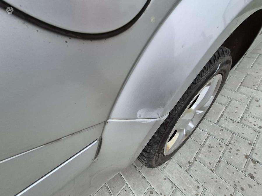 Grey Opel Astra 2007 in Panevezys, with an engine capacity of 1.91 L and mileage of 269 thousand km for 1250 €, photo 7 on AUTOMOTO.COM.LV