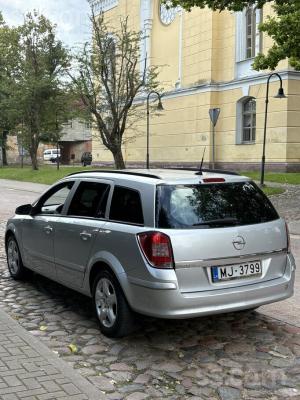 Grey Opel Astra 2007 in Saldus, with an engine capacity of 1.90 L and mileage of 258 thousand km for 2500 €, photo 14 on AUTOMOTO.COM.LV