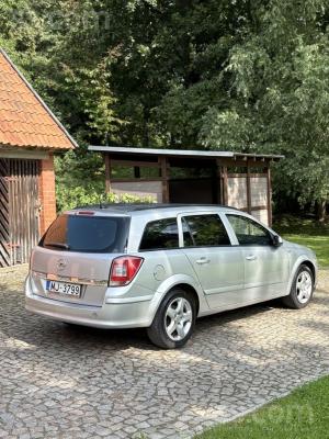Grey Opel Astra 2007 in Kuldiga, with an engine capacity of 1.90 L and mileage of 318 thousand km for 2600 €, photo 12 on AUTOMOTO.COM.LV