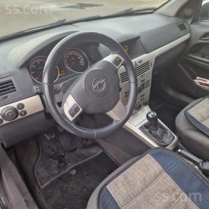 Grey Opel Astra 2007 in Riga, with an engine capacity of 1.90 L and mileage of 208 thousand km for 1100 €, photo 6 on AUTOMOTO.COM.LV