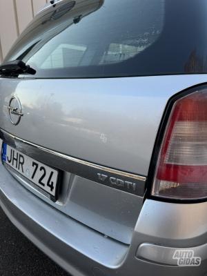 Pelēks Opel Astra 2008 Viļņa, ar dzinēja tilpumu 1.70 L un nobraukumu 335 tūkst. km par 1500 €, foto 11 vietnē AUTOMOTO.COM.LV
