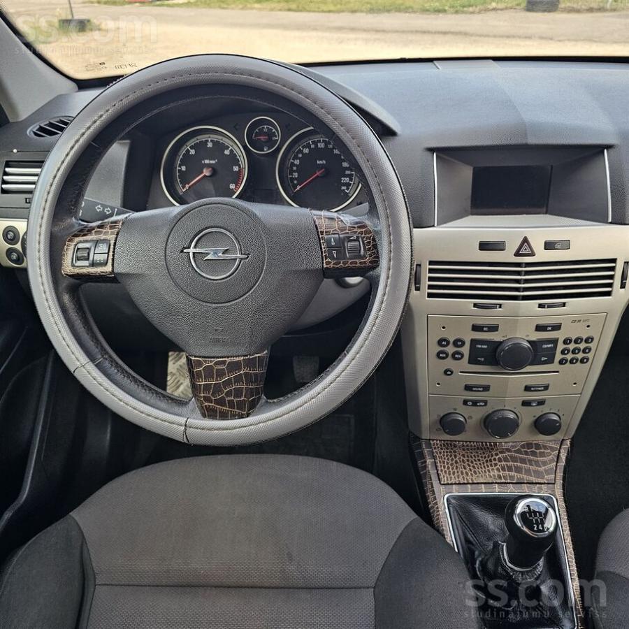 Pelēks Opel Astra 2008 Rīga, ar dzinēja tilpumu 1.90 L un nobraukumu 360 tūkst. km par 2150 €, foto 12 vietnē AUTOMOTO.COM.LV