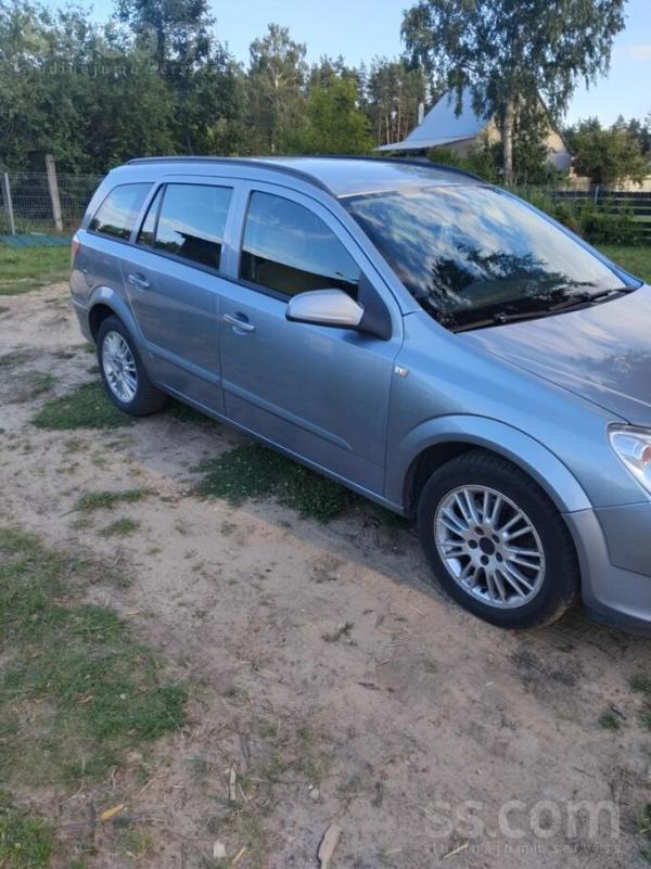 Pelēks Opel Astra 2008 Rīga, ar dzinēja tilpumu 1.90 L un nobraukumu 234 tūkst. km par 1900 €, foto 4 vietnē AUTOMOTO.COM.LV