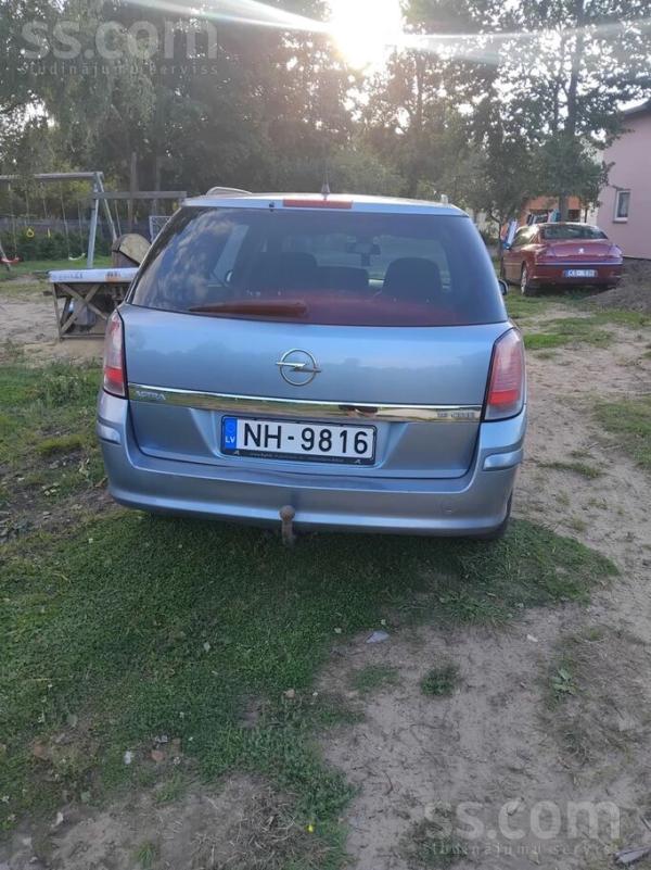 Pelēks Opel Astra 2008 Rīga, ar dzinēja tilpumu 1.90 L un nobraukumu 234 tūkst. km par 1900 €, foto 5 vietnē AUTOMOTO.COM.LV