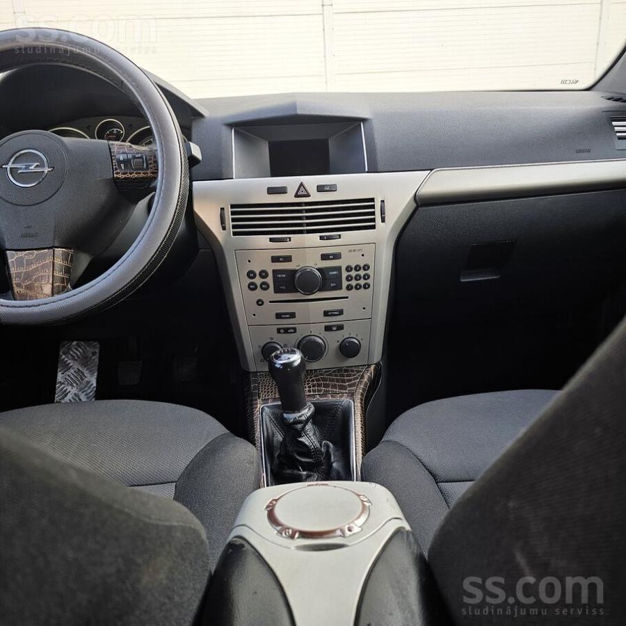 Pelēks Opel Astra 2008 Rīga, ar dzinēja tilpumu 1.90 L un nobraukumu 360 tūkst. km par 1440 €, foto 13 vietnē AUTOMOTO.COM.LV