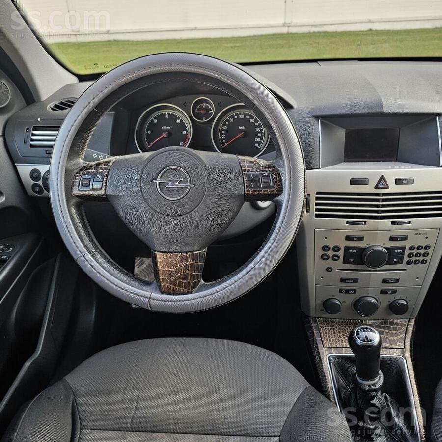 Pelēks Opel Astra 2008 Rīga, ar dzinēja tilpumu 1.90 L un nobraukumu 360 tūkst. km par 1440 €, foto 14 vietnē AUTOMOTO.COM.LV