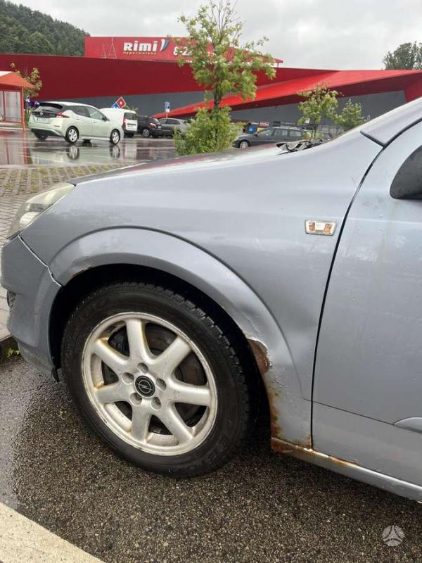 Pelēks Opel Astra 2009 Viļņa, ar dzinēja tilpumu 1.90 L un nobraukumu 350 tūkst. km par 1400 €, foto 7 vietnē AUTOMOTO.COM.LV