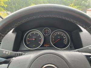 Grey Opel Astra 2009 in Vilnius, with an engine capacity of 1.90 L and mileage of 350 thousand km for 1400 €, photo 12 on AUTOMOTO.COM.LV