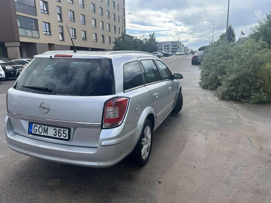 Pelēks Opel Astra 2009 Viļņa, ar dzinēja tilpumu 1.90 L un nobraukumu 300 tūkst. km par 1300 €, foto 13 vietnē AUTOMOTO.COM.LV