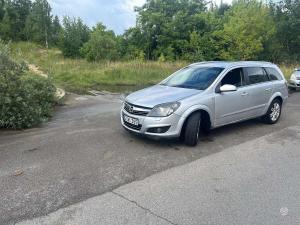 Pelēks Opel Astra 2009 Viļņa, ar dzinēja tilpumu 1.90 L un nobraukumu 300 tūkst. km par 1300 €, foto 14 vietnē AUTOMOTO.COM.LV