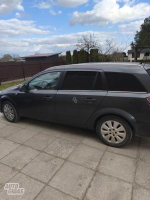 Grey Opel Astra 2010 in Silute, with an engine capacity of 1.60 L and mileage of 218 thousand km for 2200 €, photo 7 on AUTOMOTO.COM.LV