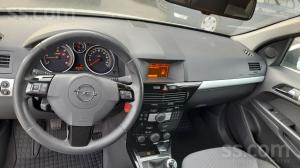 Grey Opel Astra 2010 in Riga, with an engine capacity of 1.90 L and mileage of 169 thousand km for 3000 €, photo 23 on AUTOMOTO.COM.LV