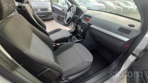 Grey Opel Astra 2010 in Riga, with an engine capacity of 1.90 L and mileage of 169 thousand km for 3000 €, photo 24 on AUTOMOTO.COM.LV