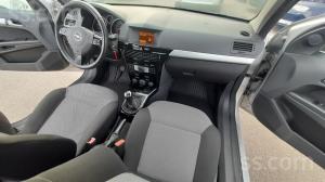 Grey Opel Astra 2010 in Riga, with an engine capacity of 1.90 L and mileage of 169 thousand km for 3000 €, photo 29 on AUTOMOTO.COM.LV