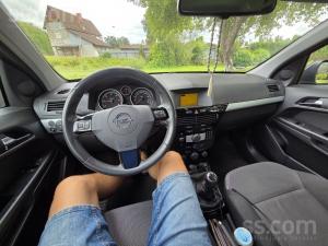 Grey Opel Astra 2010 in Riga, with an engine capacity of 1.70 L and mileage of 214 thousand km for 3000 €, photo 13 on AUTOMOTO.COM.LV