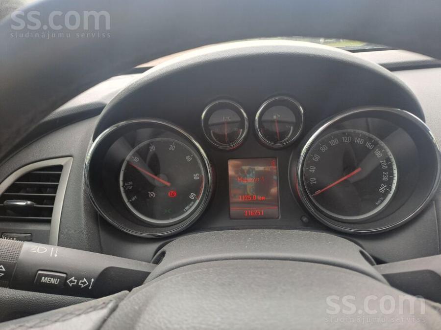 Grey Opel Astra 2011 in Daugavpils, with an engine capacity of 1.30 L and mileage of 316 thousand km for 2000 €, photo 6 on AUTOMOTO.COM.LV