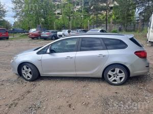 Grey Opel Astra 2011 in Daugavpils, with an engine capacity of 1.30 L and mileage of 316 thousand km for 2000 €, photo 12 on AUTOMOTO.COM.LV