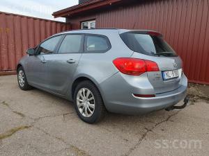 Grey Opel Astra 2011 in Liepaja, with an engine capacity of 1.70 L and mileage of 254 thousand km for 400 €, photo 2 on AUTOMOTO.COM.LV