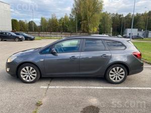 Pelēks Opel Astra 2011 Rīga, ar dzinēja tilpumu 1.70 L un nobraukumu 348 tūkst. km par 1990 €, foto 12 vietnē AUTOMOTO.COM.LV