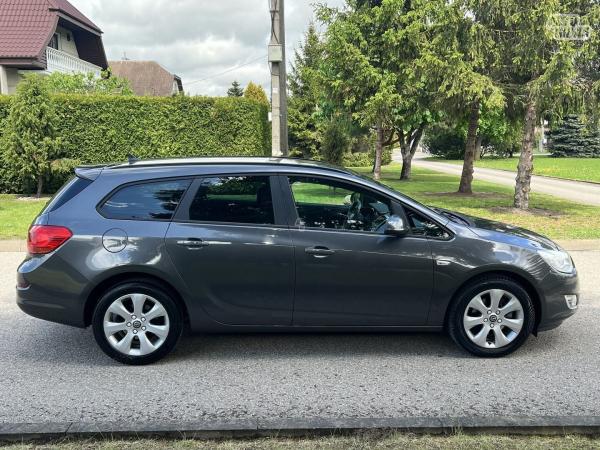 Grey Opel Astra 2011 in Kedainiai, with an engine capacity of 2.00 L and mileage of 242 thousand km for 3850 €, photo 5 on AUTOMOTO.COM.LV