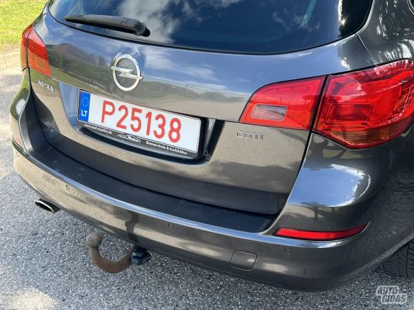 Grey Opel Astra 2011 in Kedainiai, with an engine capacity of 2.00 L and mileage of 242 thousand km for 3850 €, photo 9 on AUTOMOTO.COM.LV