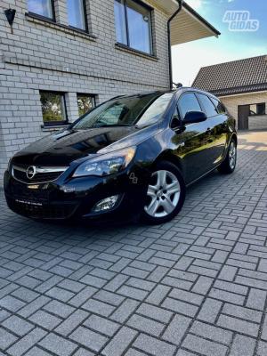 Grey Opel Astra 2011 in Kaunas, with an engine capacity of 1.70 L and mileage of 218 thousand km for 3100 €, photo 19 on AUTOMOTO.COM.LV