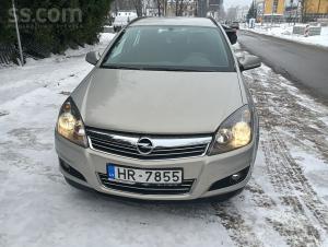 Серый Опель Астра 2011 в Рига, объемом двигателя 1.60 л и пробегом 145 тыс. км за 3900 €, фото  на AUTOMOTO.COM.LV