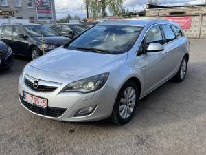 Grey Opel Astra 2011 in Riga, with an engine capacity of 1.70 L and mileage of 268 thousand km for 4490 €, photo 25 on AUTOMOTO.COM.LV