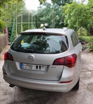 Grey Opel Astra 2011 in Siauliai, with an engine capacity of 1.96 L and mileage of 180 thousand km for 3000 €, photo 6 on AUTOMOTO.COM.LV