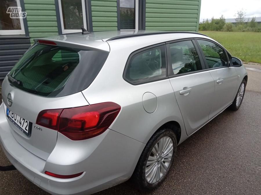Grey Opel Astra 2011 in Siauliai, with an engine capacity of 2.00 L and mileage of 310 thousand km for 2350 €, photo 7 on AUTOMOTO.COM.LV