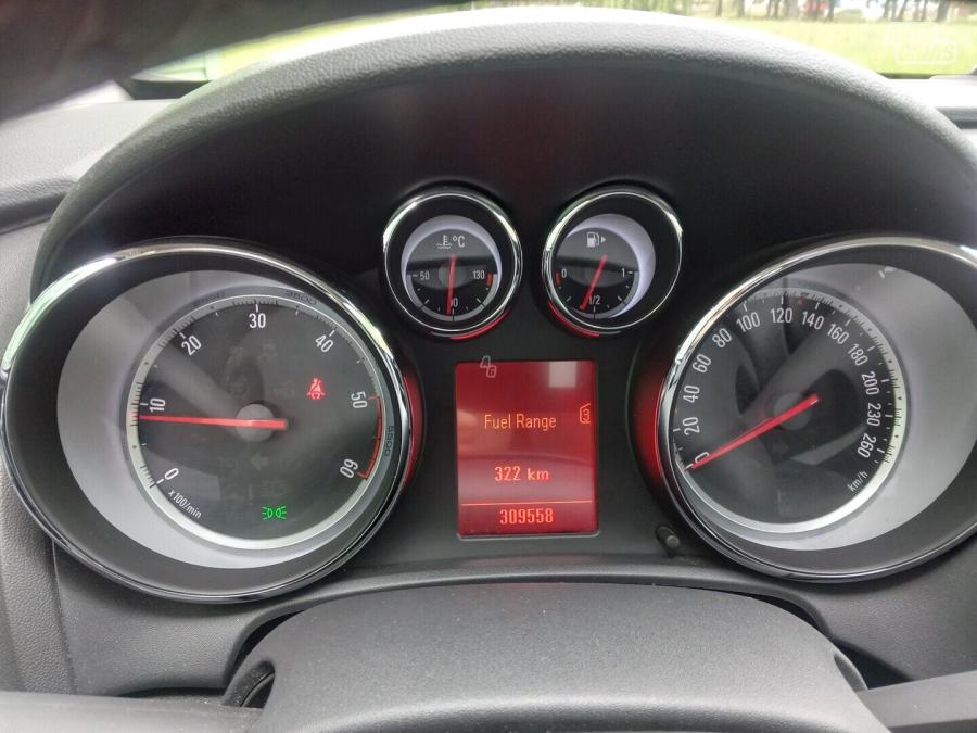 Grey Opel Astra 2011 in Siauliai, with an engine capacity of 2.00 L and mileage of 310 thousand km for 2350 €, photo 16 on AUTOMOTO.COM.LV