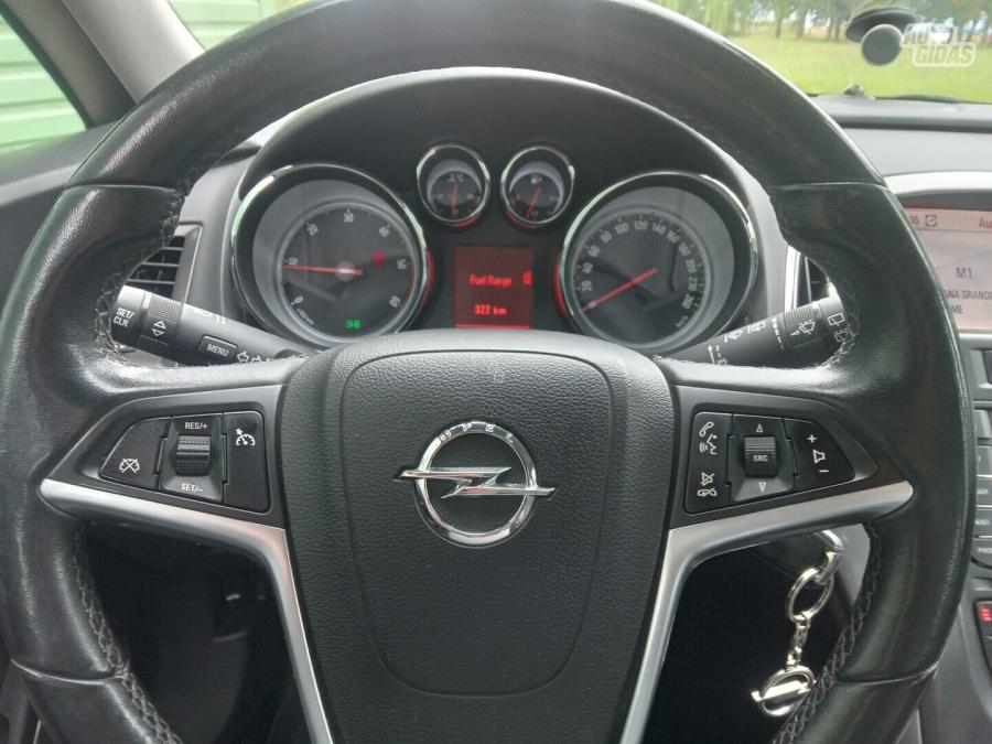 Grey Opel Astra 2011 in Siauliai, with an engine capacity of 2.00 L and mileage of 310 thousand km for 2350 €, photo 18 on AUTOMOTO.COM.LV