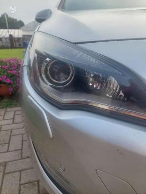 Grey Opel Astra 2011 in Rokiskis, with an engine capacity of 1.96 L and mileage of 267 thousand km for 2350 €, photo 7 on AUTOMOTO.COM.LV