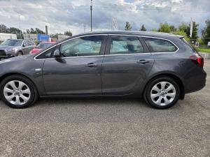 Grey Opel Astra 2011 in Marijampole, with an engine capacity of 1.69 L and mileage of 261 thousand km for 2999 €, photo 8 on AUTOMOTO.COM.LV
