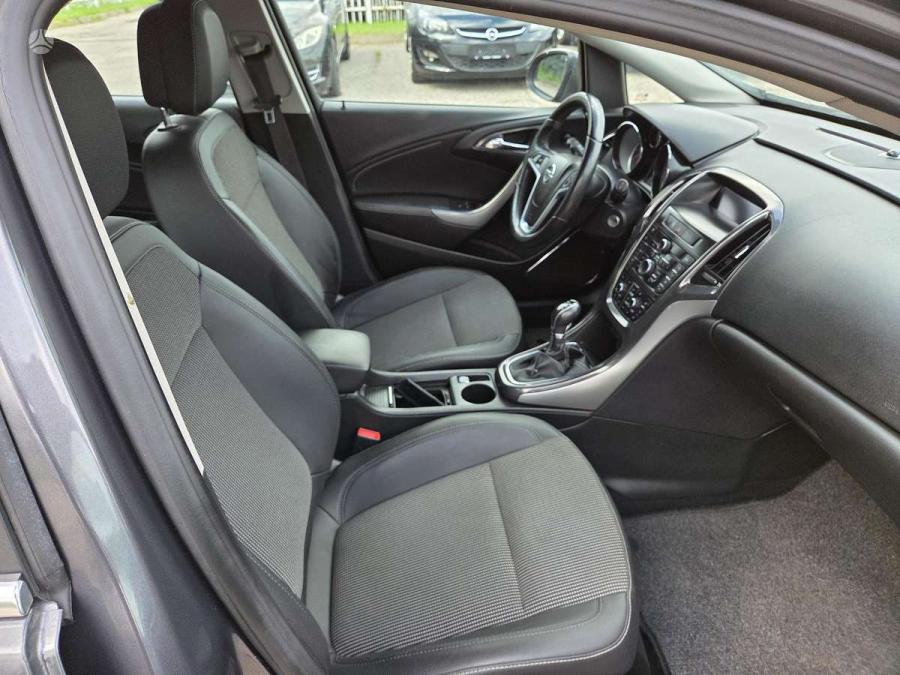 Grey Opel Astra 2011 in Marijampole, with an engine capacity of 1.69 L and mileage of 261 thousand km for 2999 €, photo 15 on AUTOMOTO.COM.LV