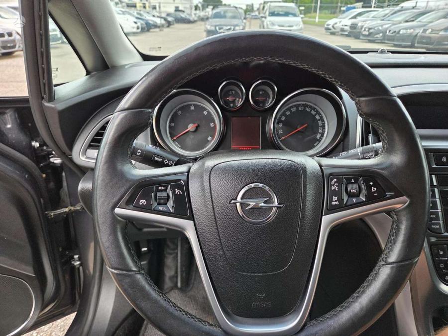 Grey Opel Astra 2011 in Marijampole, with an engine capacity of 1.69 L and mileage of 261 thousand km for 2999 €, photo 17 on AUTOMOTO.COM.LV