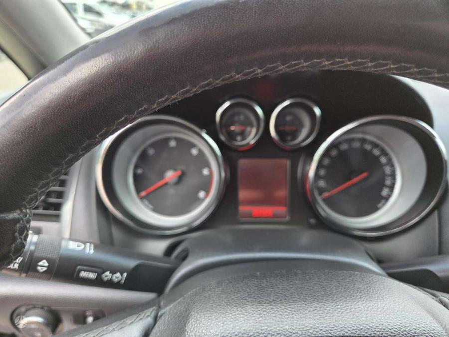Grey Opel Astra 2011 in Marijampole, with an engine capacity of 1.69 L and mileage of 261 thousand km for 2999 €, photo 18 on AUTOMOTO.COM.LV