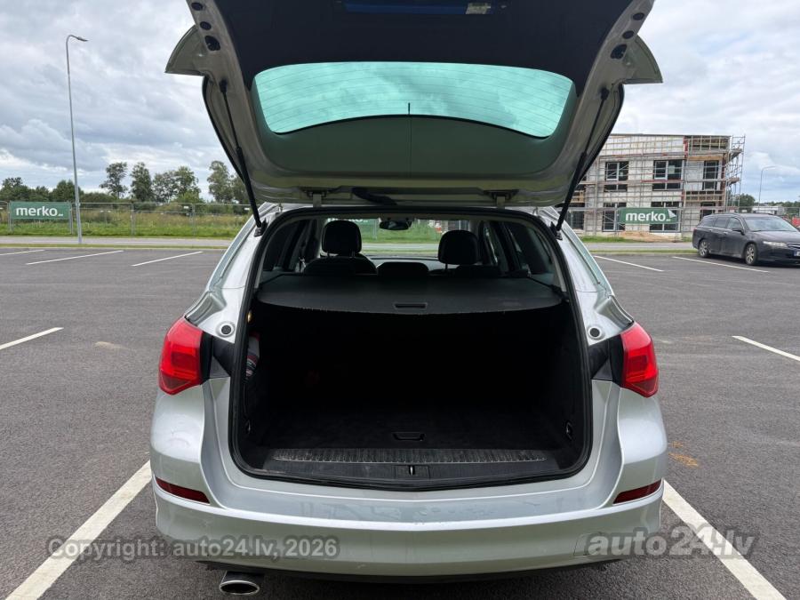 Grey Opel Astra 2011 in Keila, with an engine capacity of 1.40 L and mileage of 309 thousand km for 1499 €, photo 11 on AUTOMOTO.COM.LV