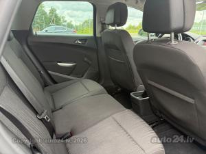 Grey Opel Astra 2011 in Keila, with an engine capacity of 1.40 L and mileage of 309 thousand km for 1499 €, photo 14 on AUTOMOTO.COM.LV