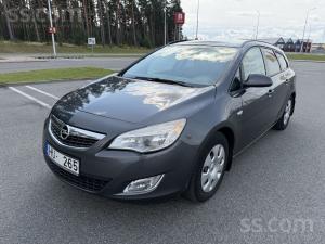 Grey Opel Astra 2011 in Riga, with an engine capacity of 1.70 L and mileage of 210 thousand km for 3690 €, photo  on AUTOMOTO.COM.LV