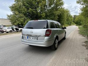 Grey Opel Astra 2011 in Riga, with an engine capacity of 1.60 L and mileage of 111 thousand km for 1900 €, photo 4 on AUTOMOTO.COM.LV