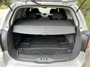 Grey Opel Astra 2011 in Riga, with an engine capacity of 1.60 L and mileage of 111 thousand km for 1900 €, photo 12 on AUTOMOTO.COM.LV