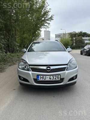 Grey Opel Astra 2011 in Riga, with an engine capacity of 1.60 L and mileage of 111 thousand km for 1900 €, photo 17 on AUTOMOTO.COM.LV