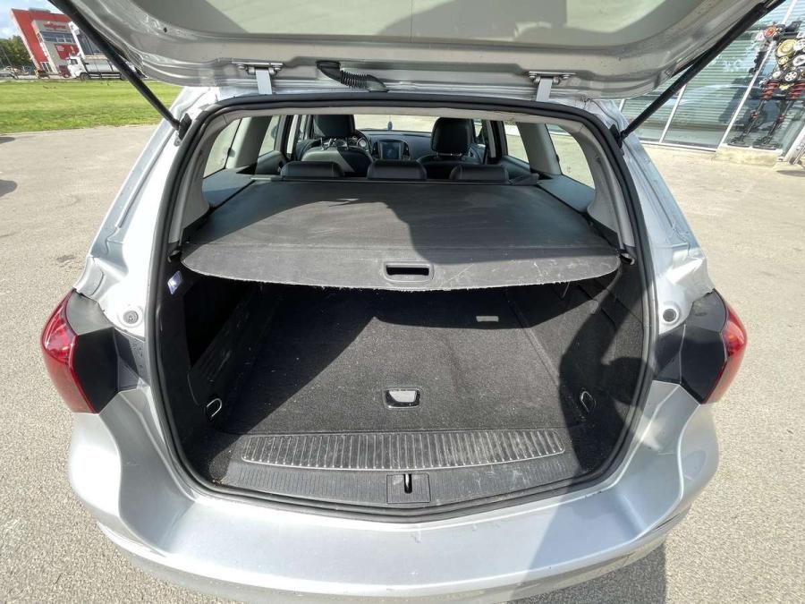 Grey Opel Astra 2011 in Siauliai, with an engine capacity of 1.69 L and mileage of 345 thousand km for 2150 €, photo 14 on AUTOMOTO.COM.LV