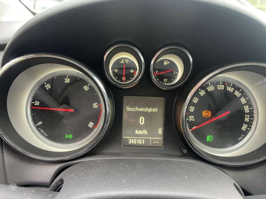 Grey Opel Astra 2011 in Siauliai, with an engine capacity of 1.69 L and mileage of 345 thousand km for 2150 €, photo 21 on AUTOMOTO.COM.LV