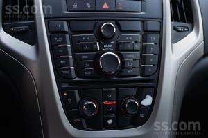 Grey Opel Astra 2011 in Riga, with an engine capacity of 1.70 L and mileage of 299 thousand km for 4290 €, photo 19 on AUTOMOTO.COM.LV