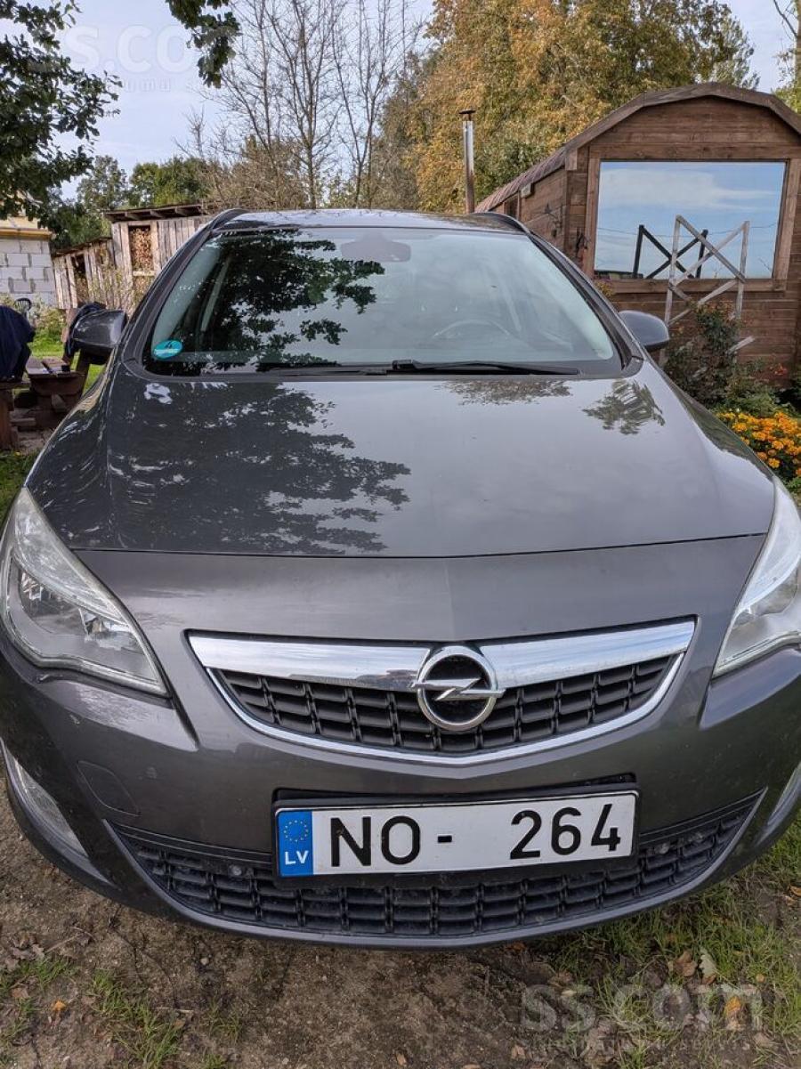 Grey Opel Astra 2011 in Jekabpils, with an engine capacity of 1.40 L and mileage of 236 thousand km for 2700 €, photo 7 on AUTOMOTO.COM.LV