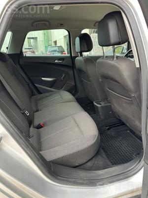 Grey Opel Astra 2011 in Jelgava, with an engine capacity of 1.70 L and mileage of 213 thousand km for 2100 €, photo 13 on AUTOMOTO.COM.LV