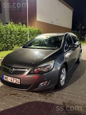 Grey Opel Astra 2011 in Riga, with an engine capacity of 2.00 L and mileage of 265 thousand km for 3800 €, photo 5 on AUTOMOTO.COM.LV